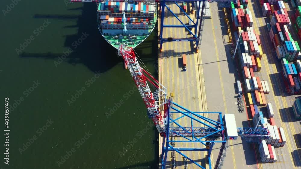 Container ship loading at port with crane, container ship carrying ...
