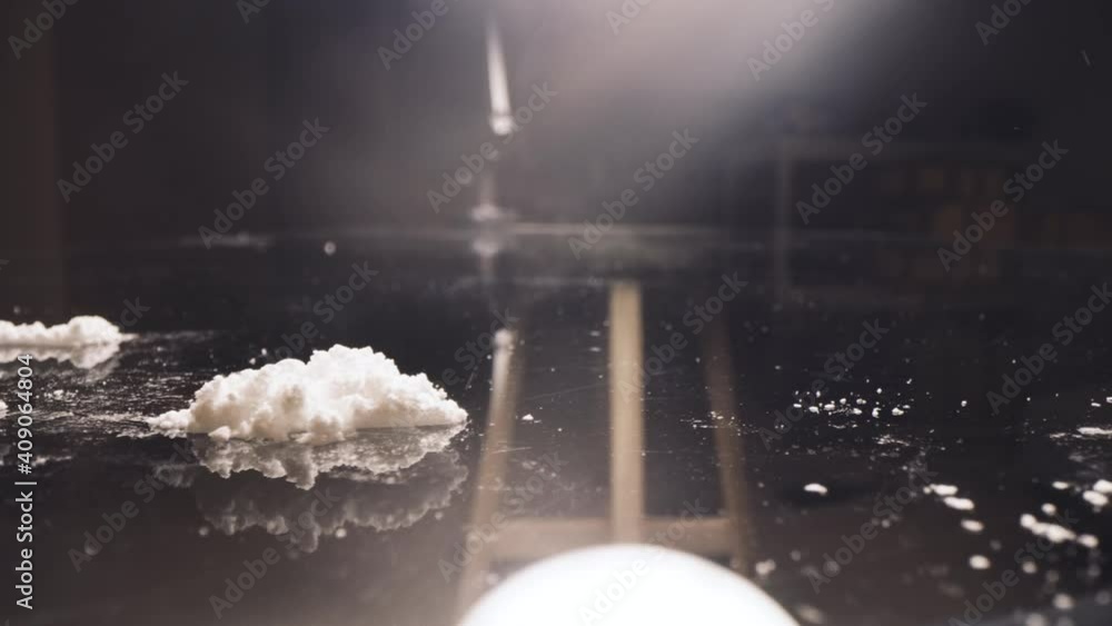 Cocaine junkie snorting line of coke with rolled US dollar bill. Drug ...