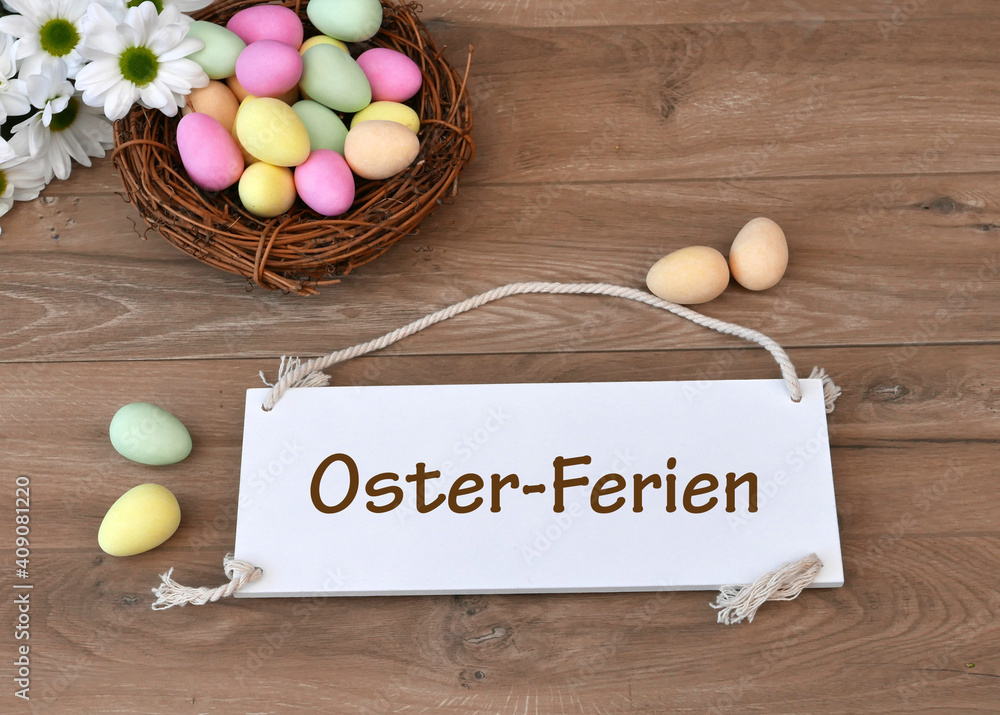 Schild mit dem Schriftzug Osterferien Stock Photo | Adobe Stock
