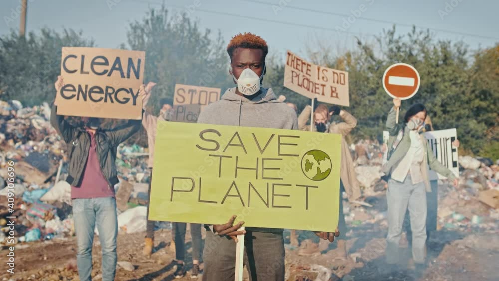 Portrait of a Young Black Man Activist With a Poster Calling to Take ...
