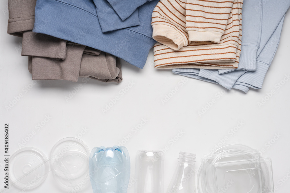 Trendy modern clothes made from recycled plastic. Eco products and zero ...