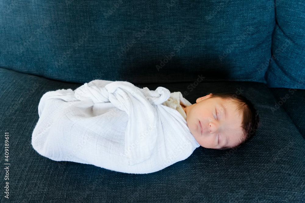 Swaddled newborn baby sleeping Stock Photo | Adobe Stock