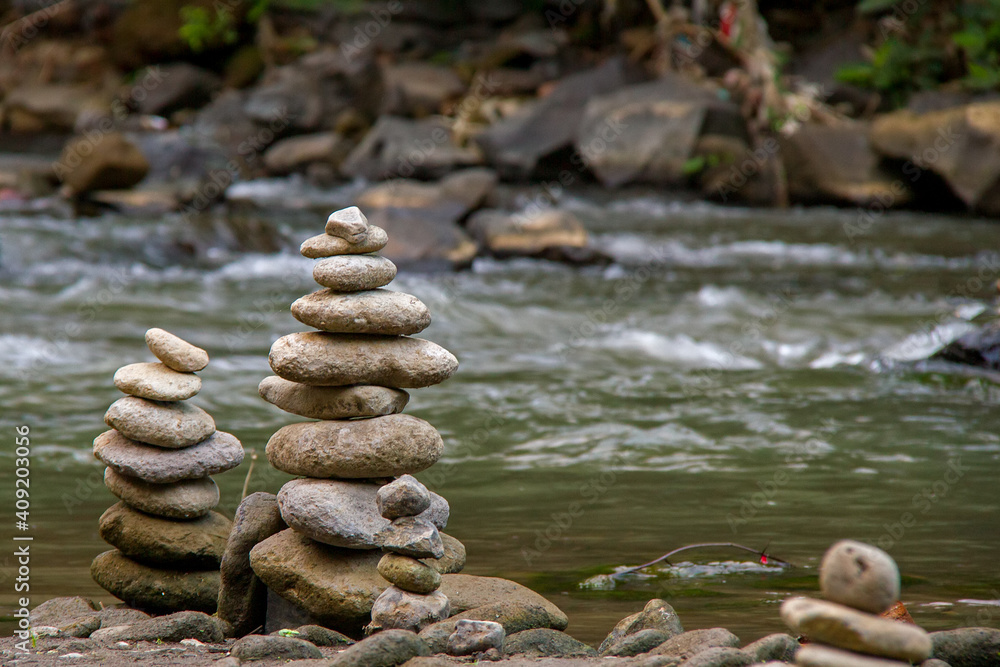 Zen Stacked Stones at the Majestic Tegenungan Waterfalls in Bali ...