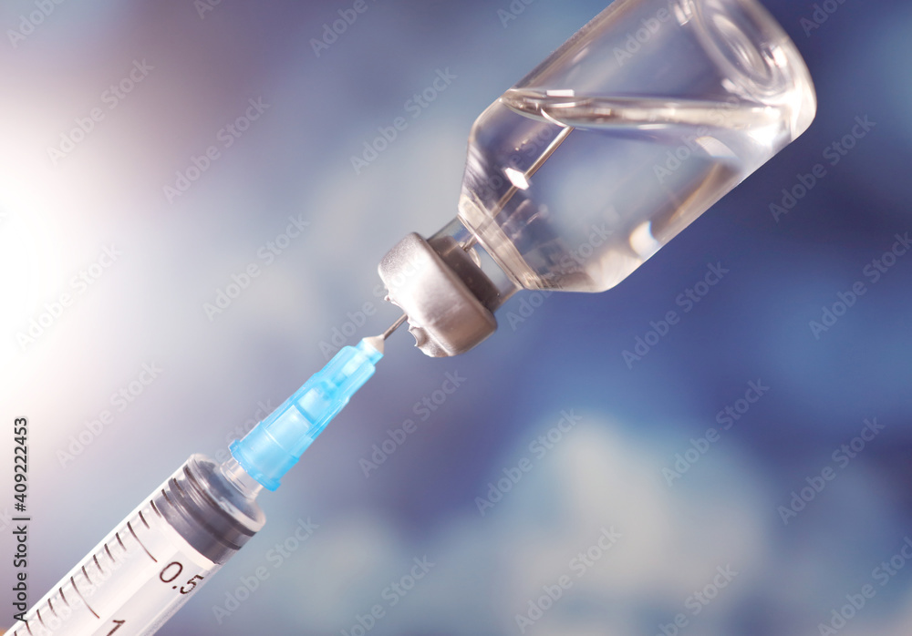 COVID-19. Vaccine, test and syringe for injection. Immunization and ...