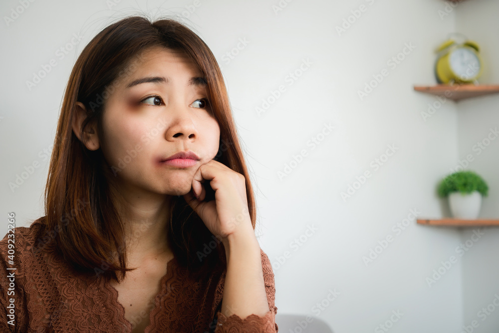 violence in family concept with abused Asian woman sitting with sad ...