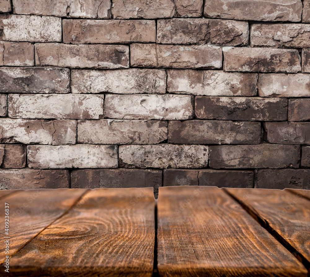 wooden table on a background of brickwork. image in loft style. brown ...