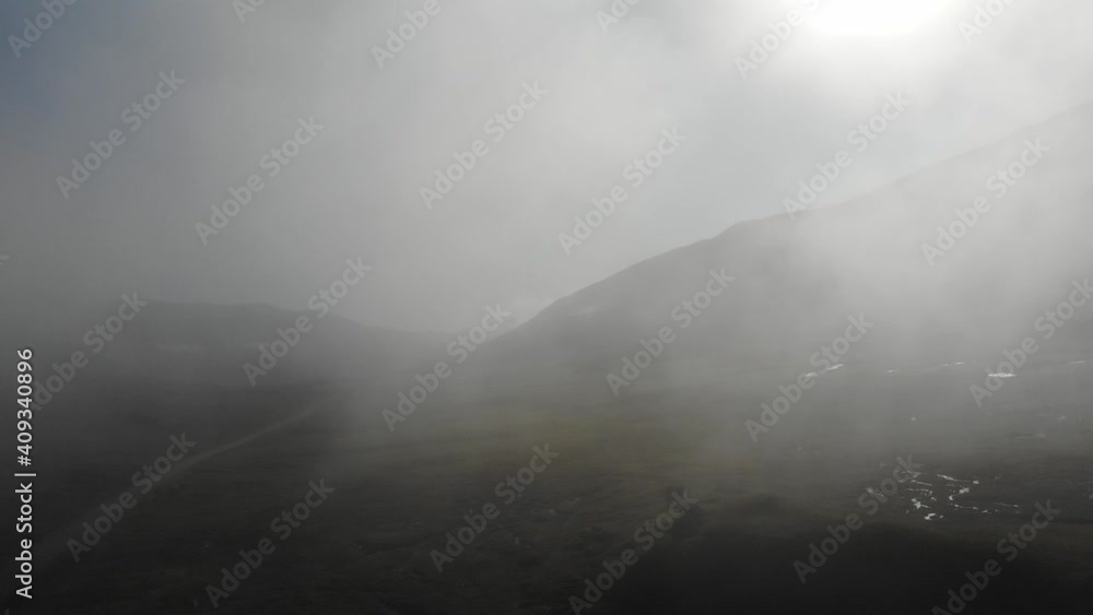 On the A87 road towards the Isle of Skye, a cinematic aerial shot ...