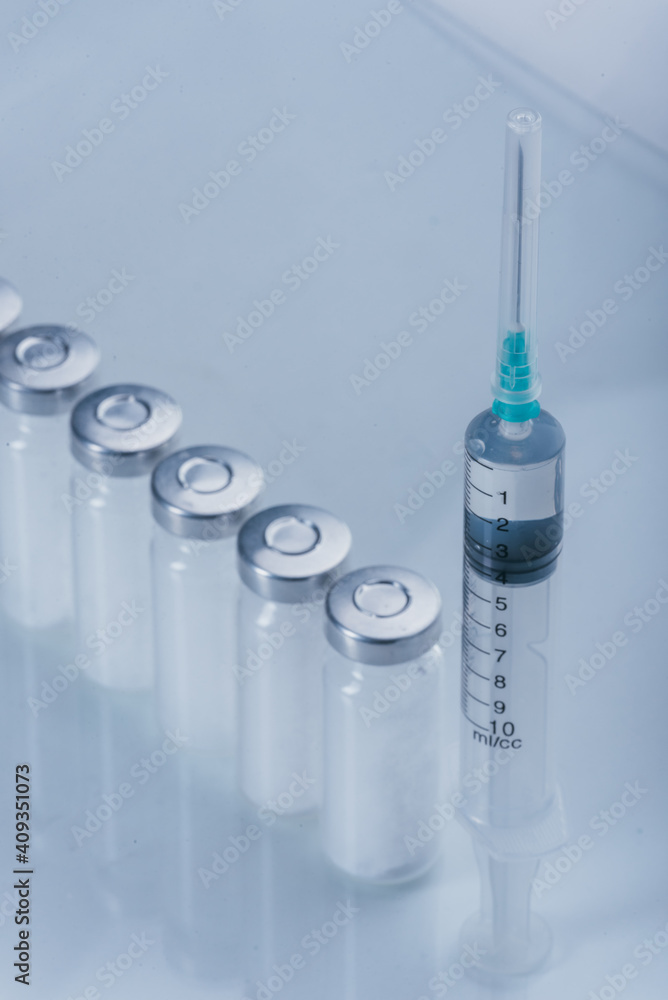 Medicine, Injection, vaccine and disposable syringe, drug concept ...