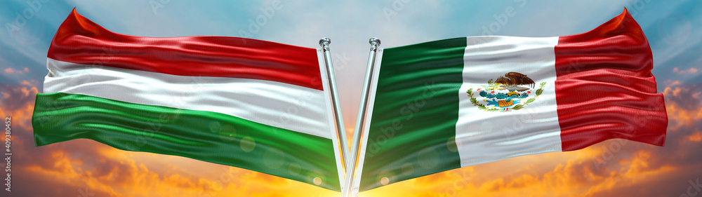 Mexico Flag and Hungary flag waving with texture sky Cloud and sunset ...