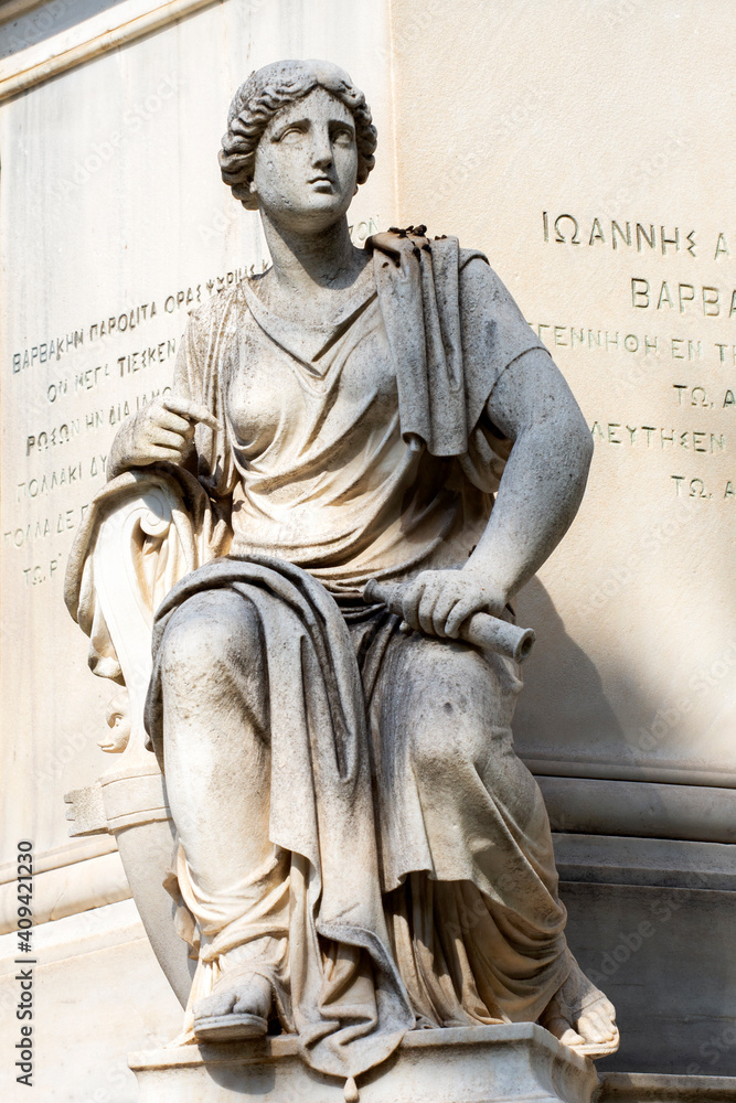 Marble statue on the base of the statue of Ioannis Varvakis in the ...