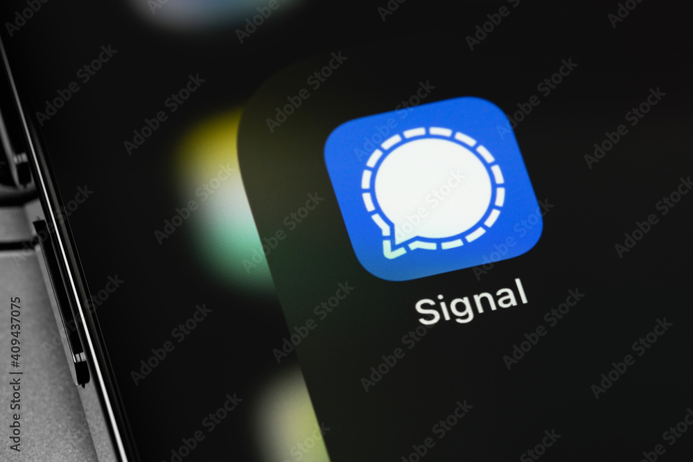 Signal mobile icon app on a display smartphone. Signal is a free and open source client ...