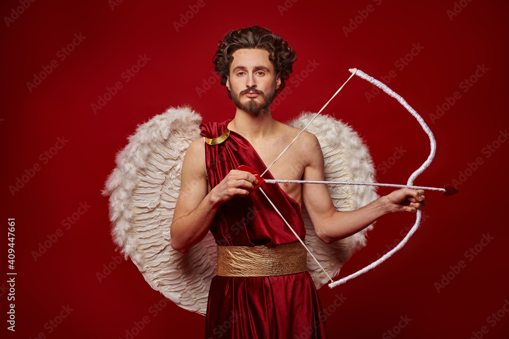 Cupid with bow and arrow Stock Photo | Adobe Stock