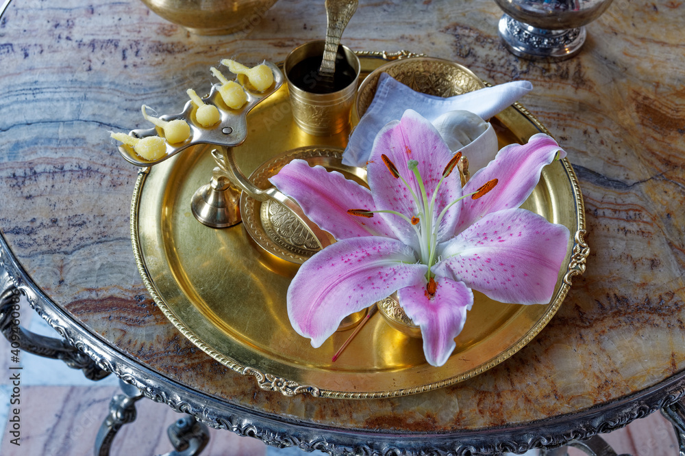 Puja tray and accessories for worship in the Hare Krishna temple. Stock ...