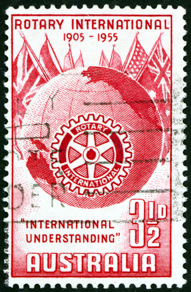 Postage stamp Australia 1955 globe, flags and Rotary emblem Stock Photo ...