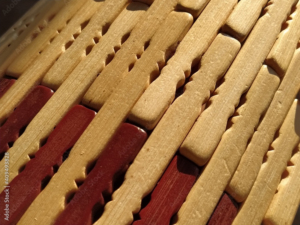 reed or wood mat. The rug is a mat under the hot. Knitted processed ...