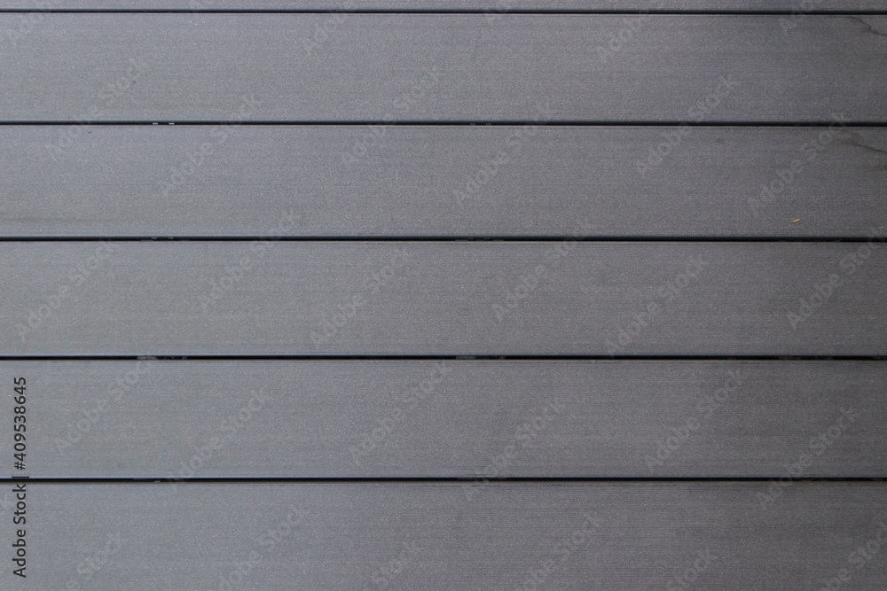 Background: modern silver gray timber piling, wood texture planks with ...