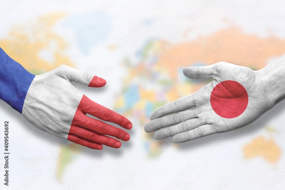 France and Japan - Flag handshake symbolizing partnership and ...