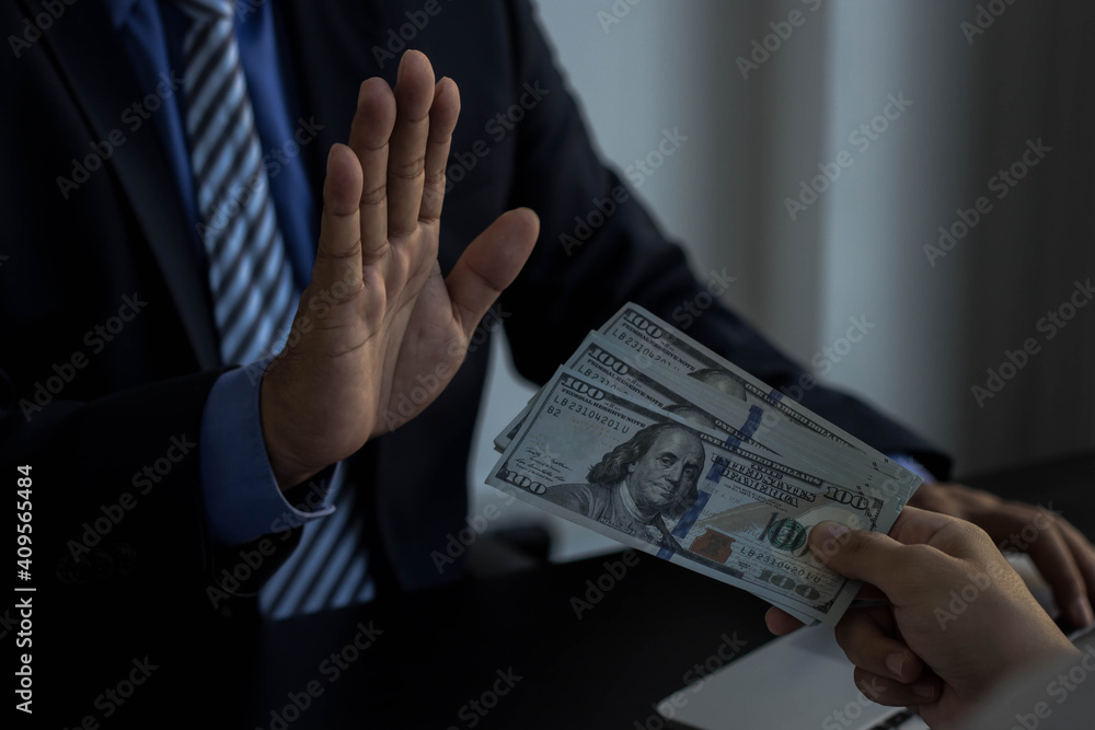 Businessmen refuse to accept bribes from business partners offering ...