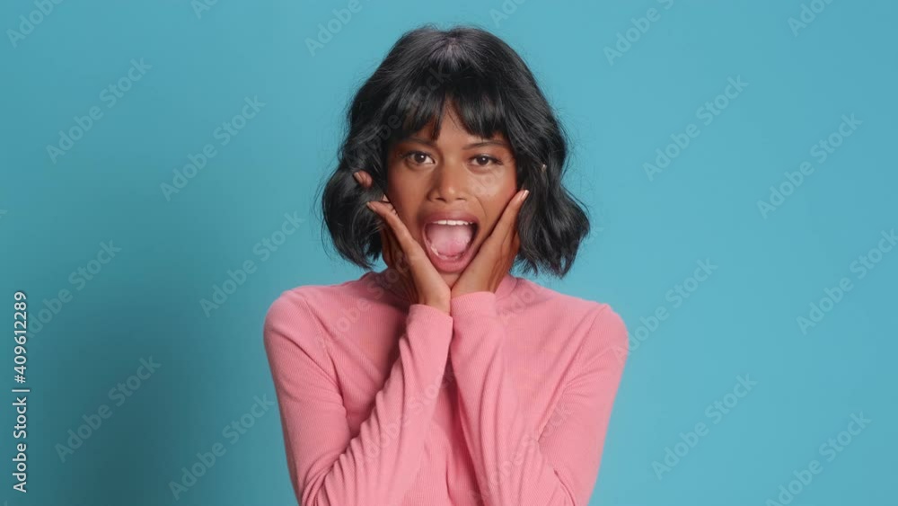 Impressed Beautiful Dark Skinned Woman Looks With Shocked Surprised