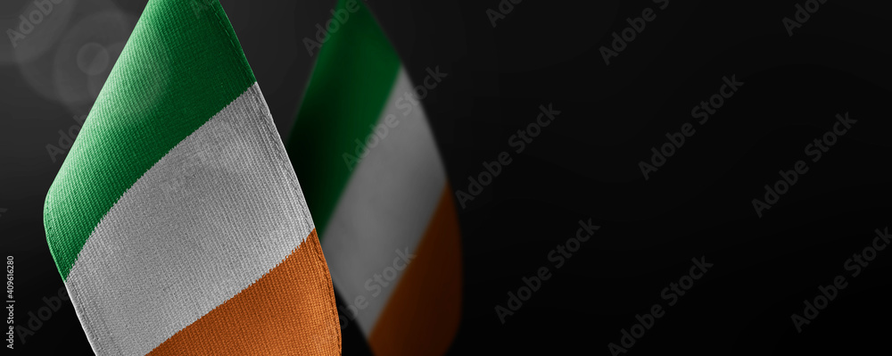Small national flags of the Ireland on a dark background Photos | Adobe ...