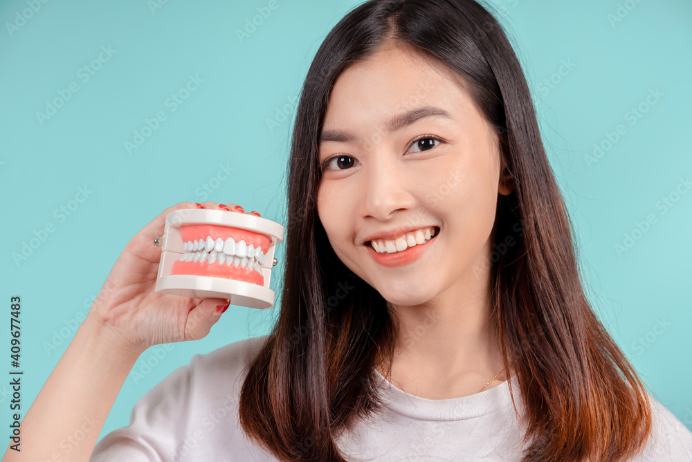 Dental of asian woman with tooth sample and white teeth increase ...