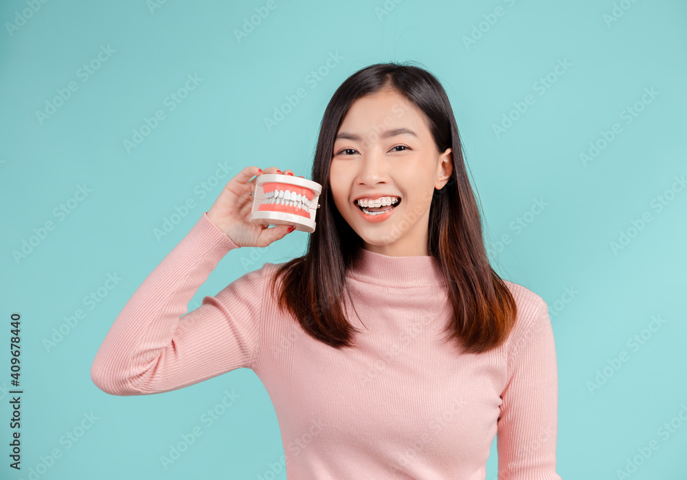 Dental of asian woman with tooth sample and white teeth increase ...
