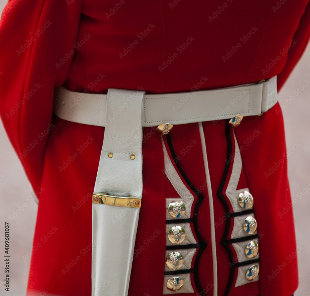 British army guard in red tunic and bearskin on parade at the Trooping ...