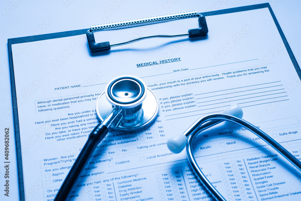 Filling and signing medical card of a patient concept. Close up photo ...