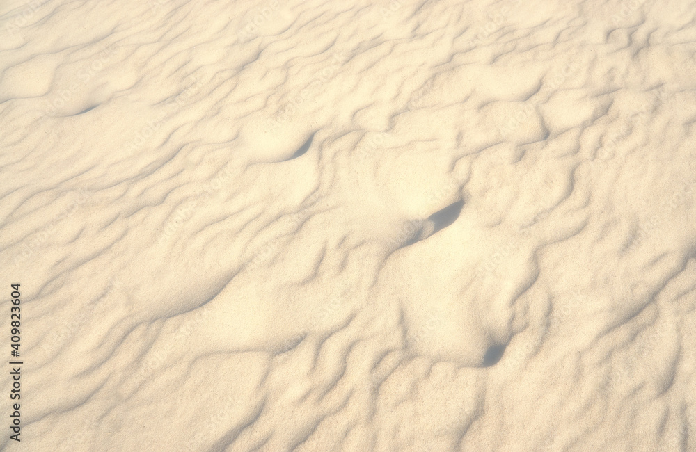 Light beach sand as a travel background with texture. Stock-Foto ...