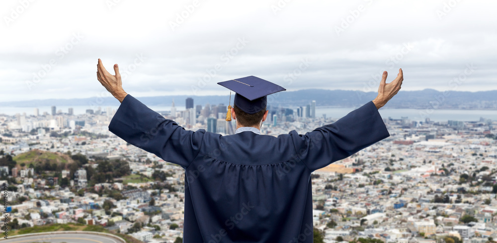 education, graduation and people concept - happy male graduate student ...