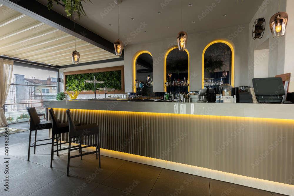 Long bar counter in empty hotel cafe bar Stock Photo | Adobe Stock