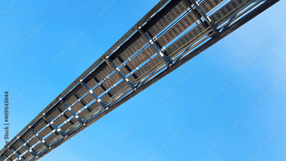 Bottom view of stainless steel electrical or communication cable tray ...