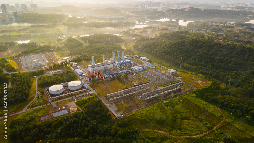 Aerial view of a Gas Turbine Power Plant Station during sunrise. Gas ...