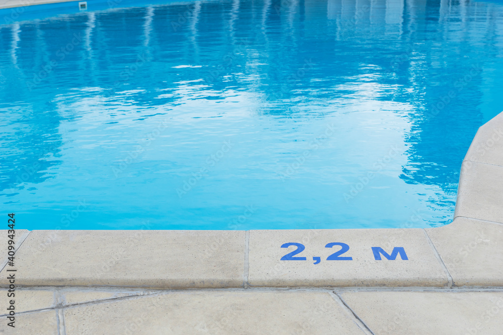 close up image of signs of depth in meters in swimming pool, deep pool ...