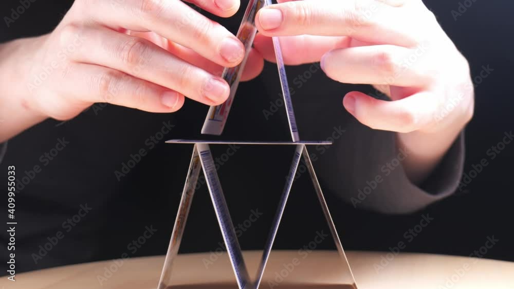 building a house of cards. House of cards symbol of financial pyramid ...