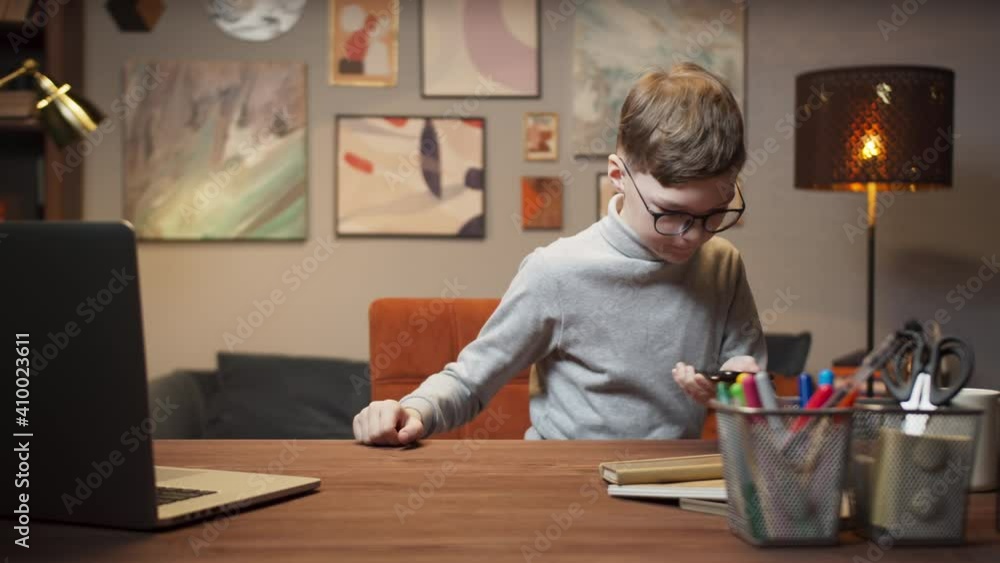 Kid boy using phone with AR 3D liar scan sensor, building mixed ...