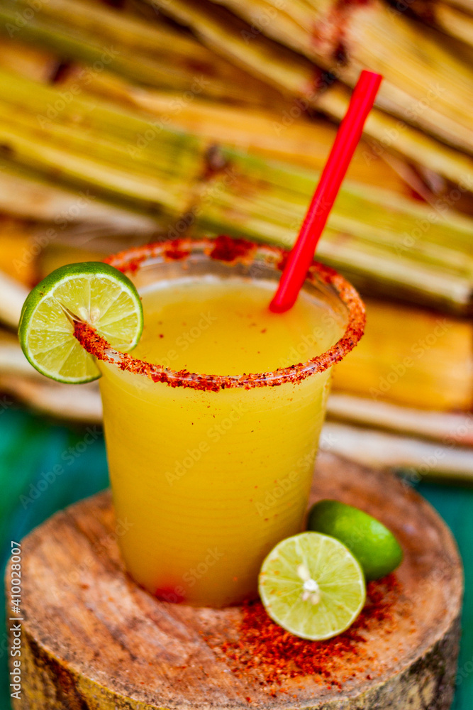 Sugarcane juice, guarapo de caña o jugo de caña de azucar. Stock Photo ... Sugarcane juice, guarapo de caña o jugo de caña de azucar. Stock Photo ...