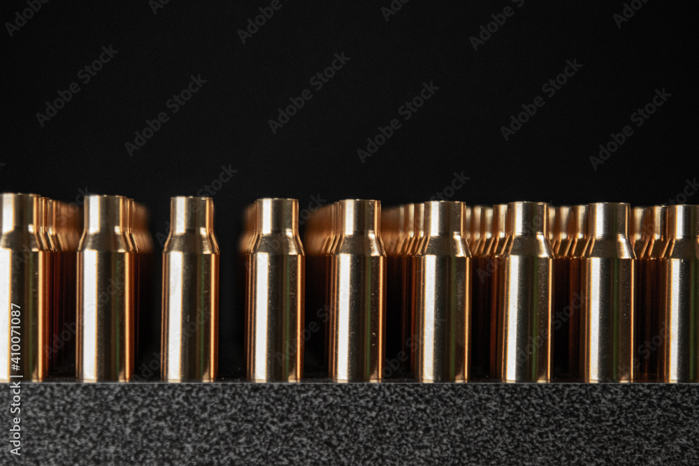 Cases in a wooden stand on a black background, preparation for ...