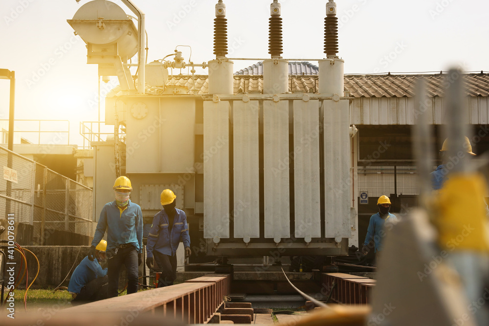 Installation of large power transformers using slings Stock Photo ...