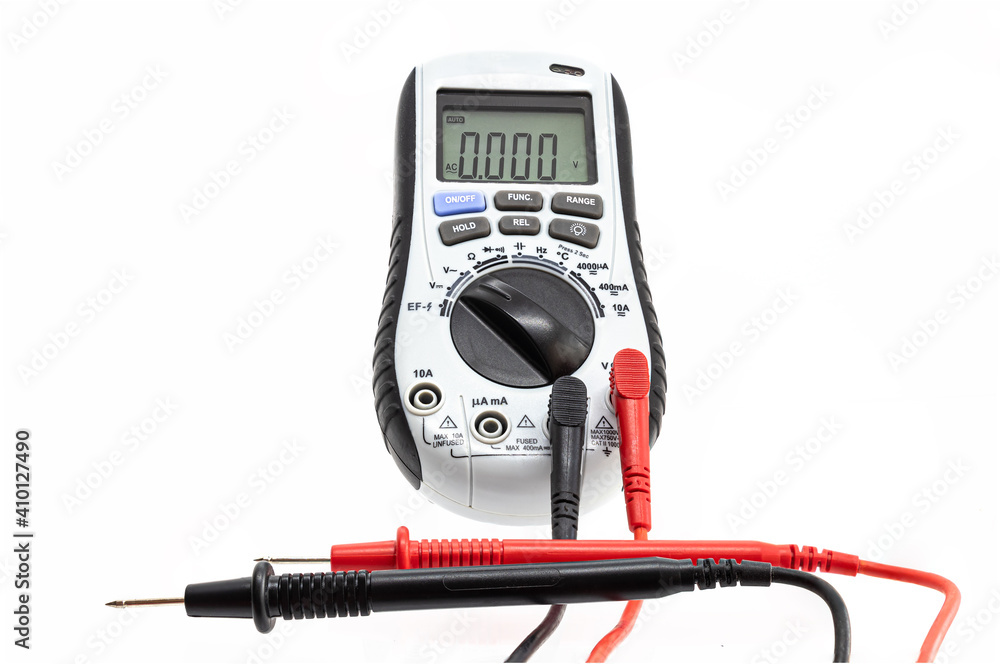 digital multimeter with test probes, in the AC voltage reading position ...