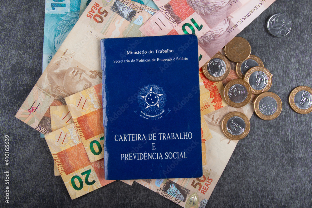Brazilian work card with real bills and coins Stock Photo | Adobe Stock