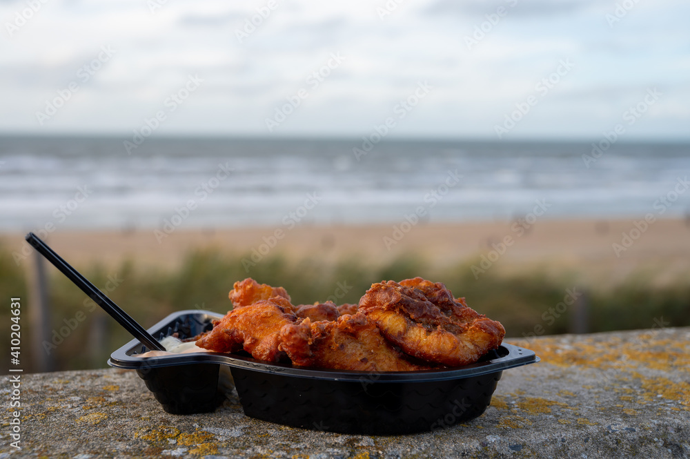 Dutch street seafood, deep fried cod fish fillet with garlic sauce ...