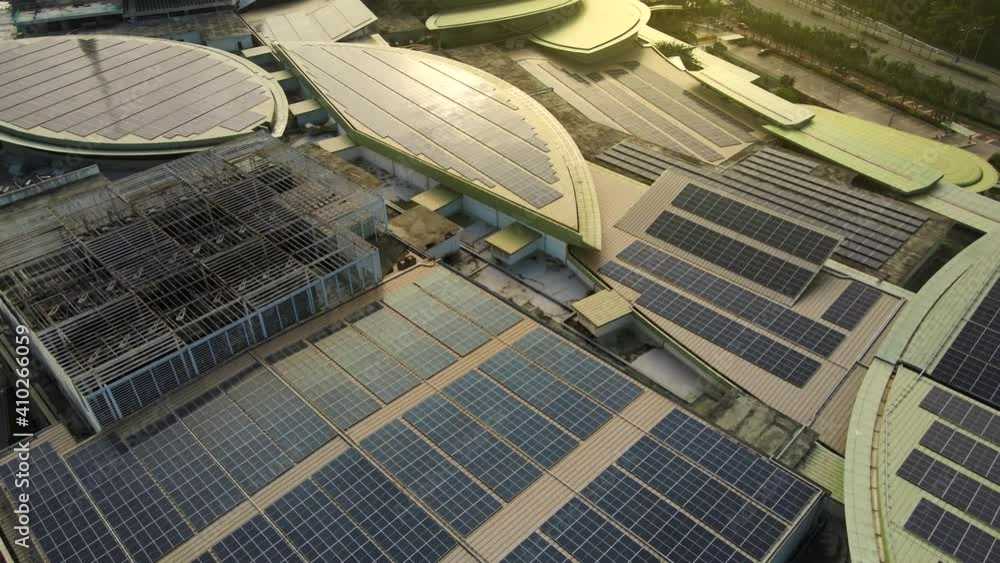 4K UHD Footage Of Aerial view of a solar panel on building roof top ...