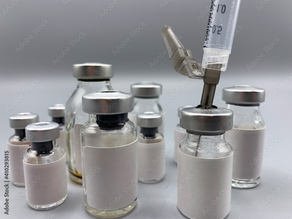 Syringe and vials with blank labels, space to place text Stock Photo ...