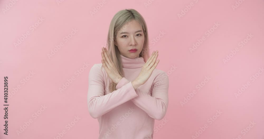 Video Stock Studio portrait of young beautiful Asian woman in pink long ...