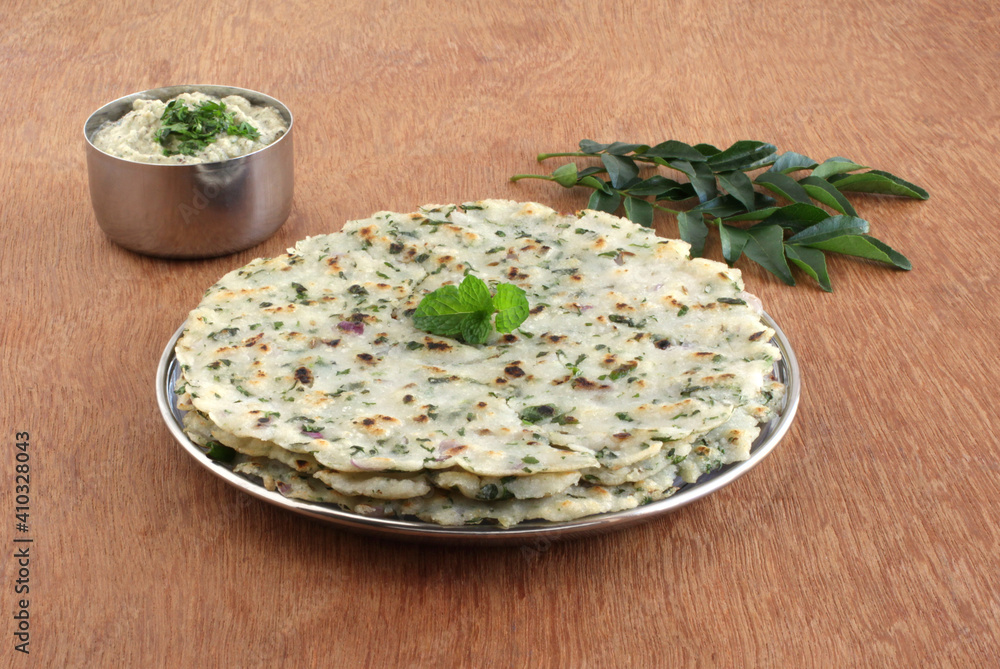 Masala roti, a delicious, spicy, and vegetarian Indian flat bread, on a ...