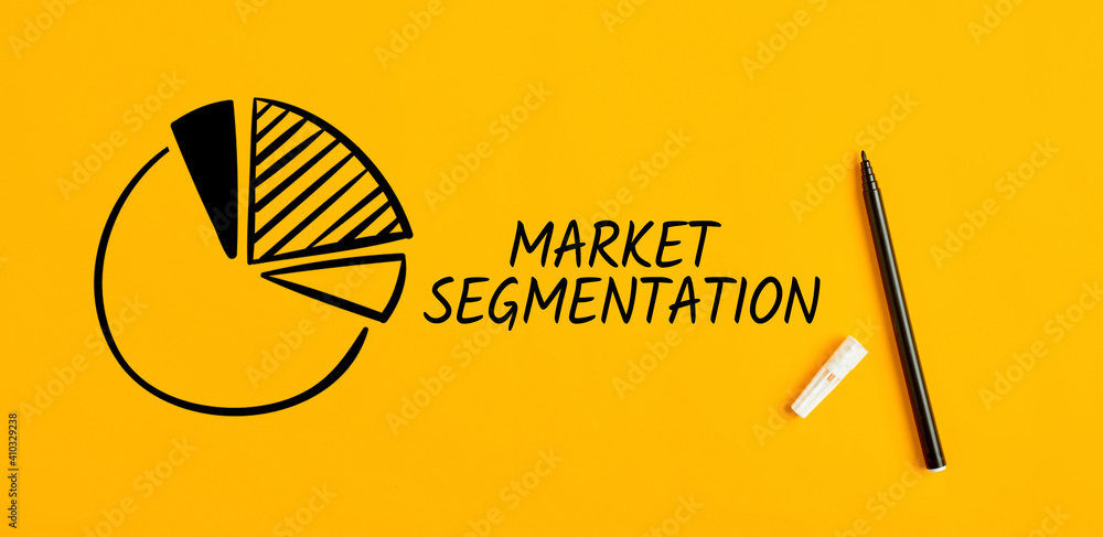 The word market segmentation with a hand drawn pie chart sketch on ...