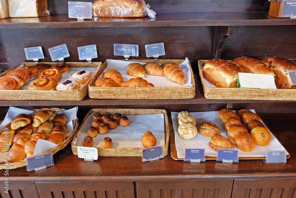 Assorted bread and toast displayed in bakery pastry shop Stock Photo ...