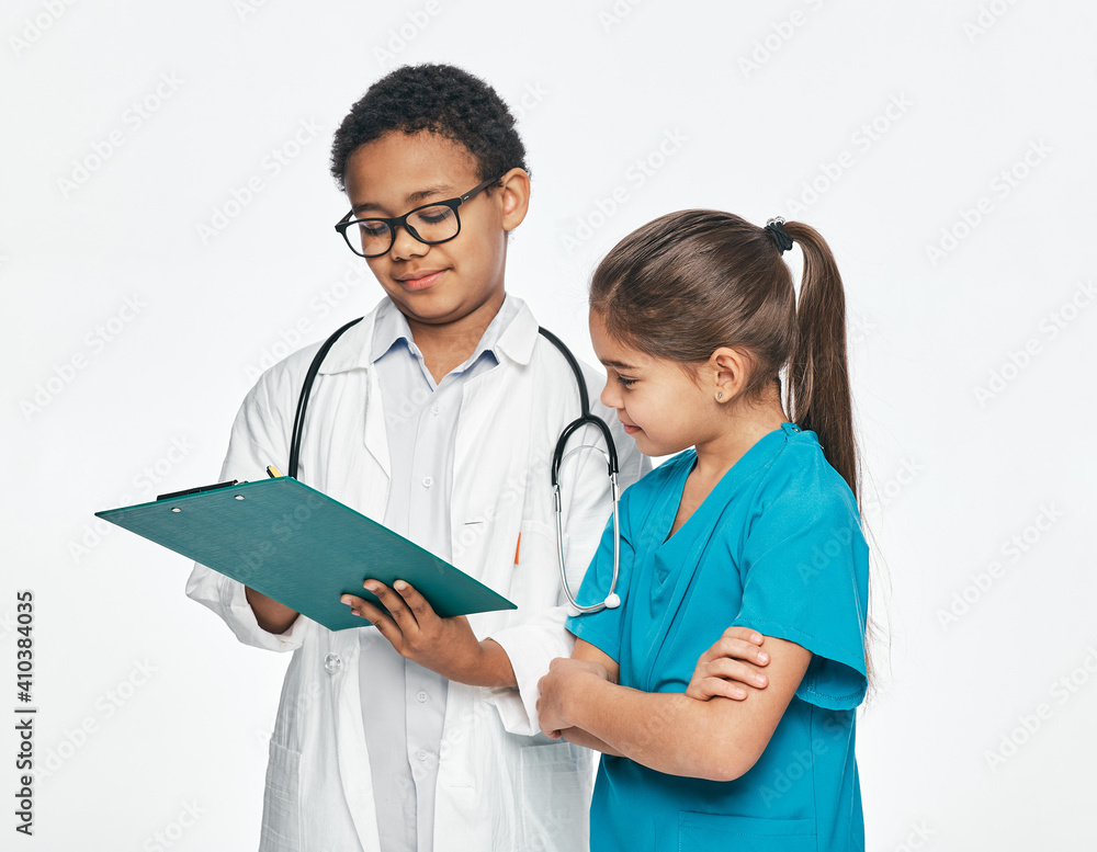 Two children play medical staff and choose a medical profession ...