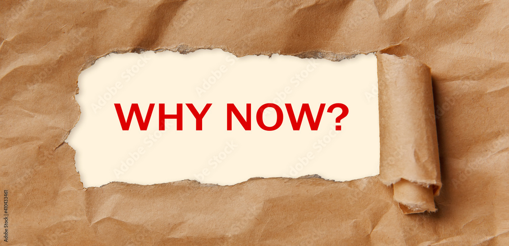 Text - WHY NOW - appearing behind torn brown paper Stock Photo | Adobe ...